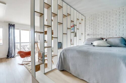 Small Studio Apartment Uses See-Through Shelving as an Elegant ...