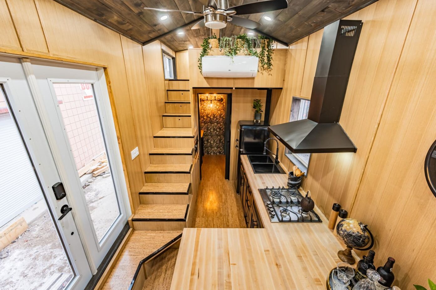 Canadian Tiny House Features Hidden Door Disguised as Bookshelf ...