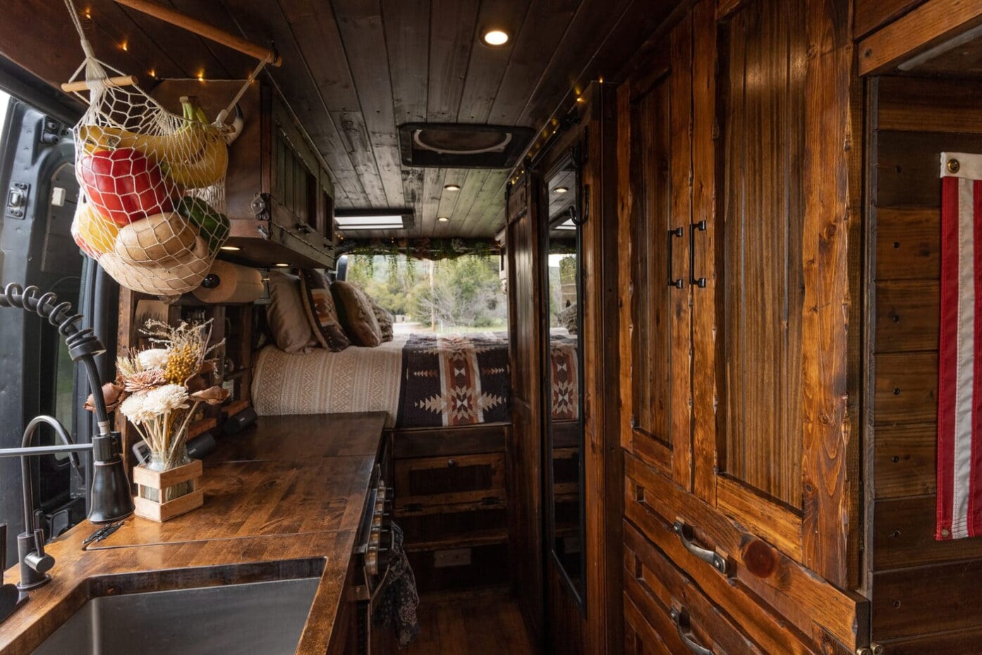 Adventurous Couple Transforms Cargo Van Into Rustic Cabin on Wheels ...