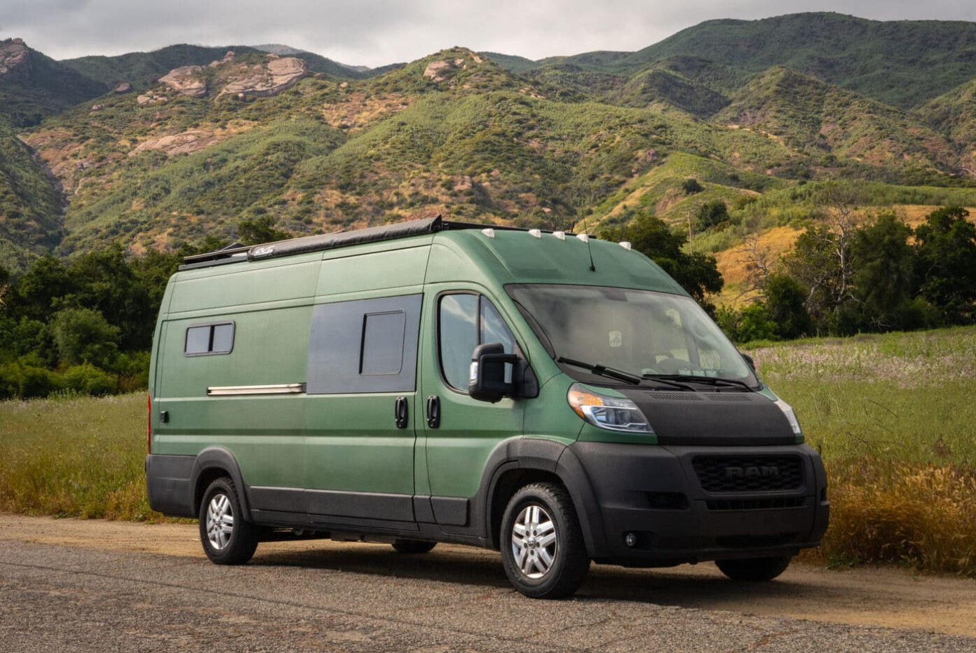 Adventurous Couple Transforms Cargo Van Into Rustic Cabin on Wheels ...