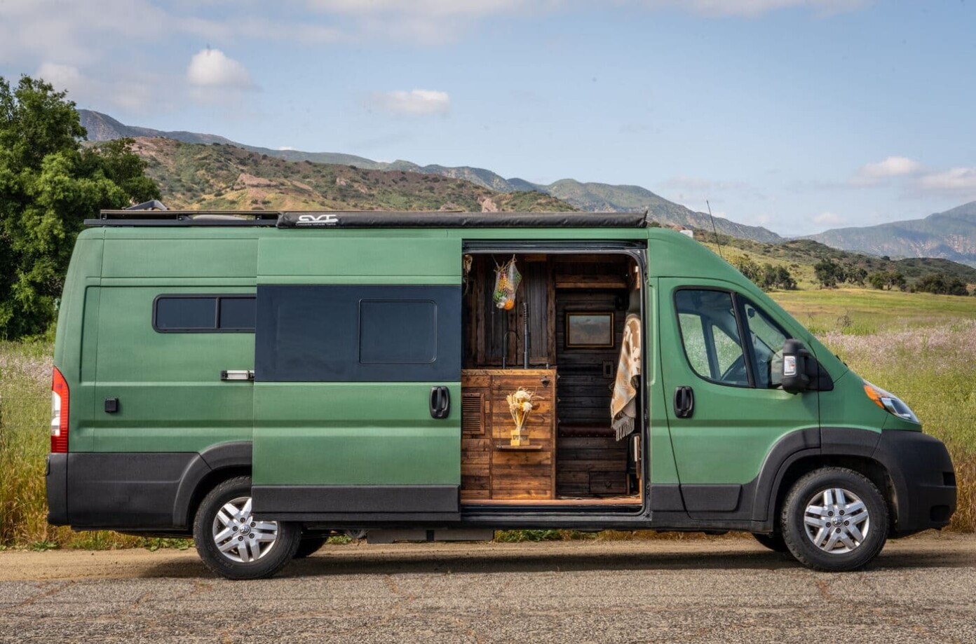 Adventurous Couple Transforms Cargo Van Into Rustic Cabin on Wheels ...