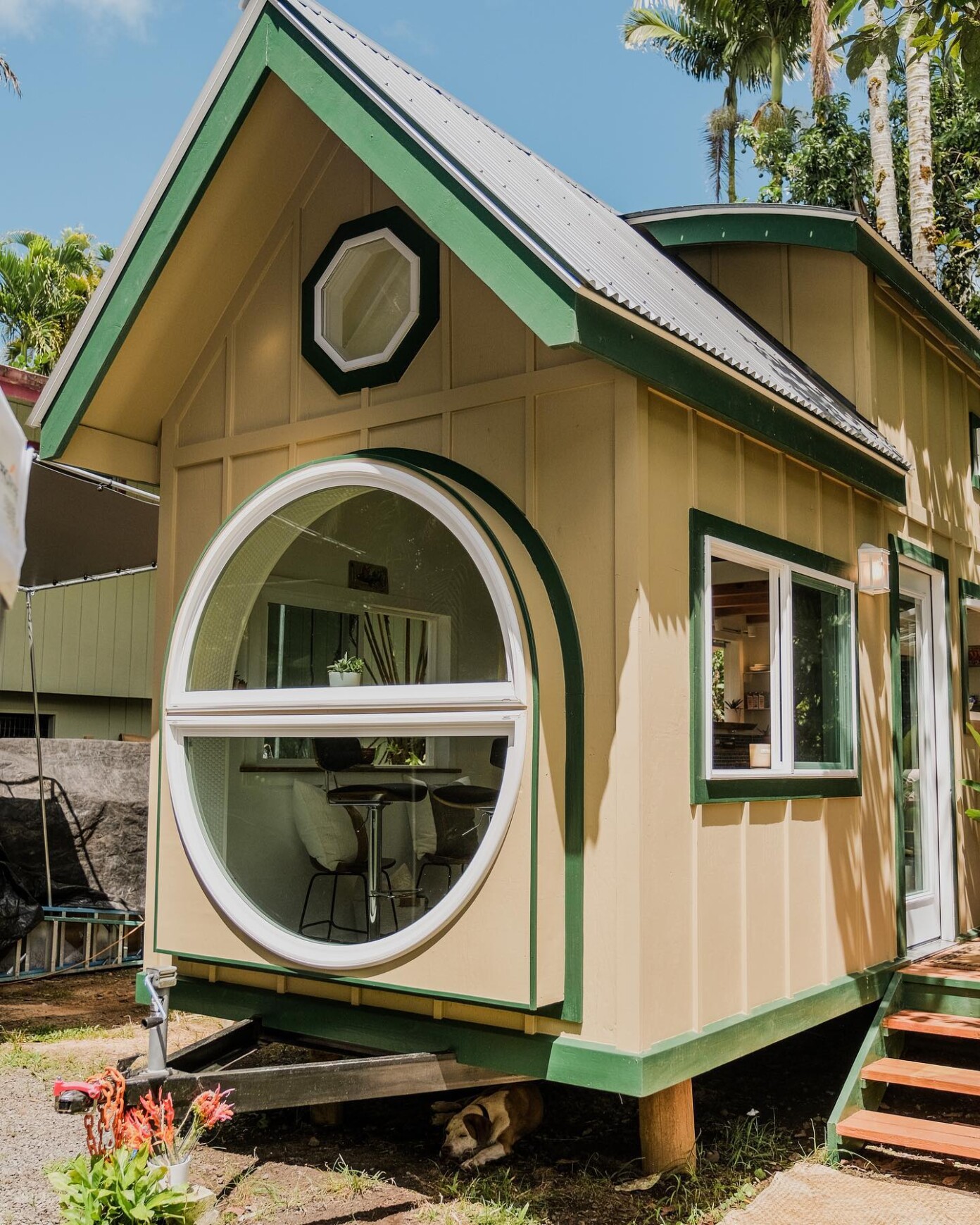 Sleek Tiny House Boasts Enormous Round Window, Outdoor Bar Pass-Through ...