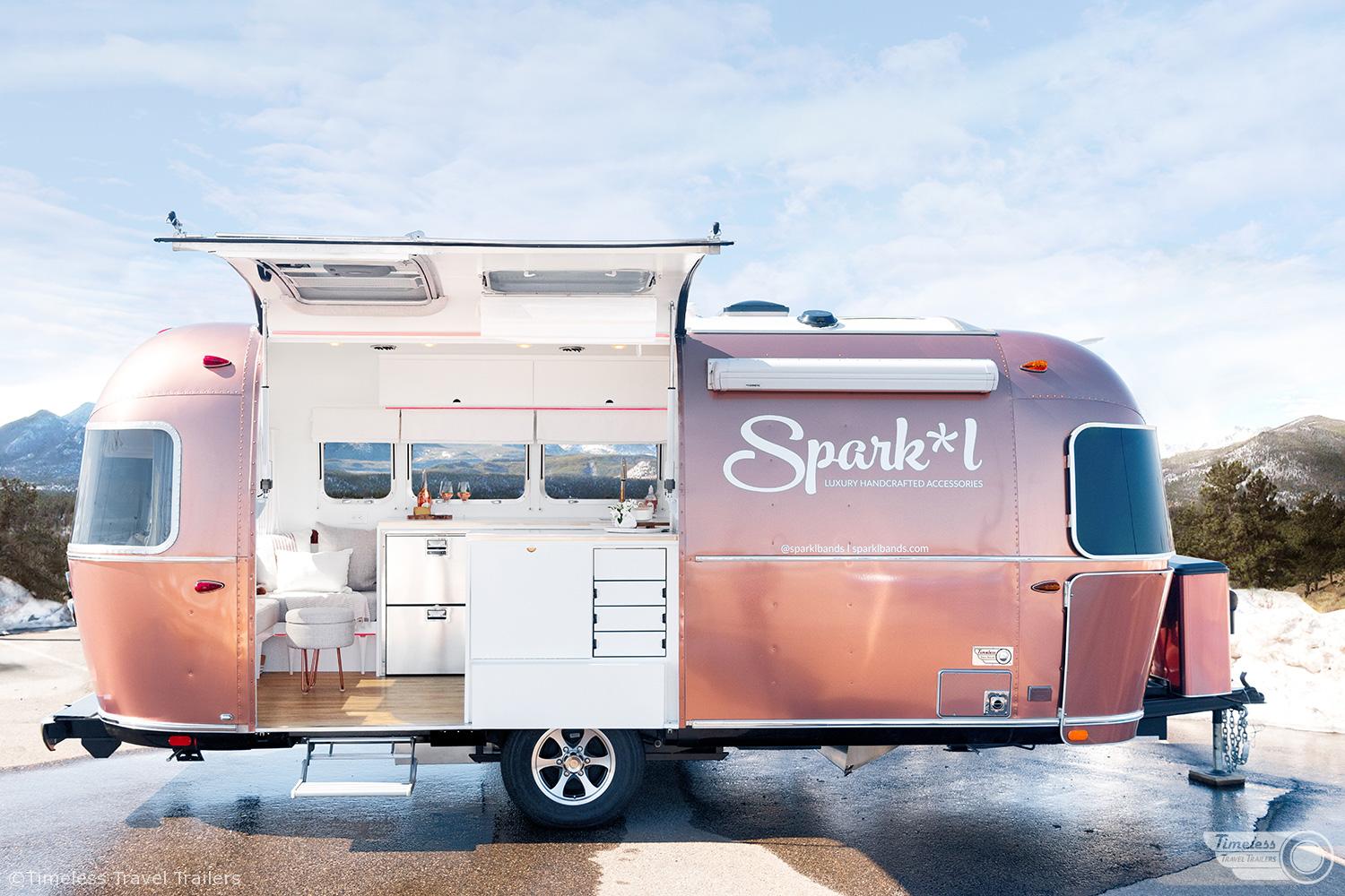 Meet Rosie: The 22-Foot Rose-Gold Airstream with a Built-in Tesla ...