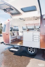 Meet Rosie: The 22-Foot Rose-Gold Airstream with a Built-in Tesla ...