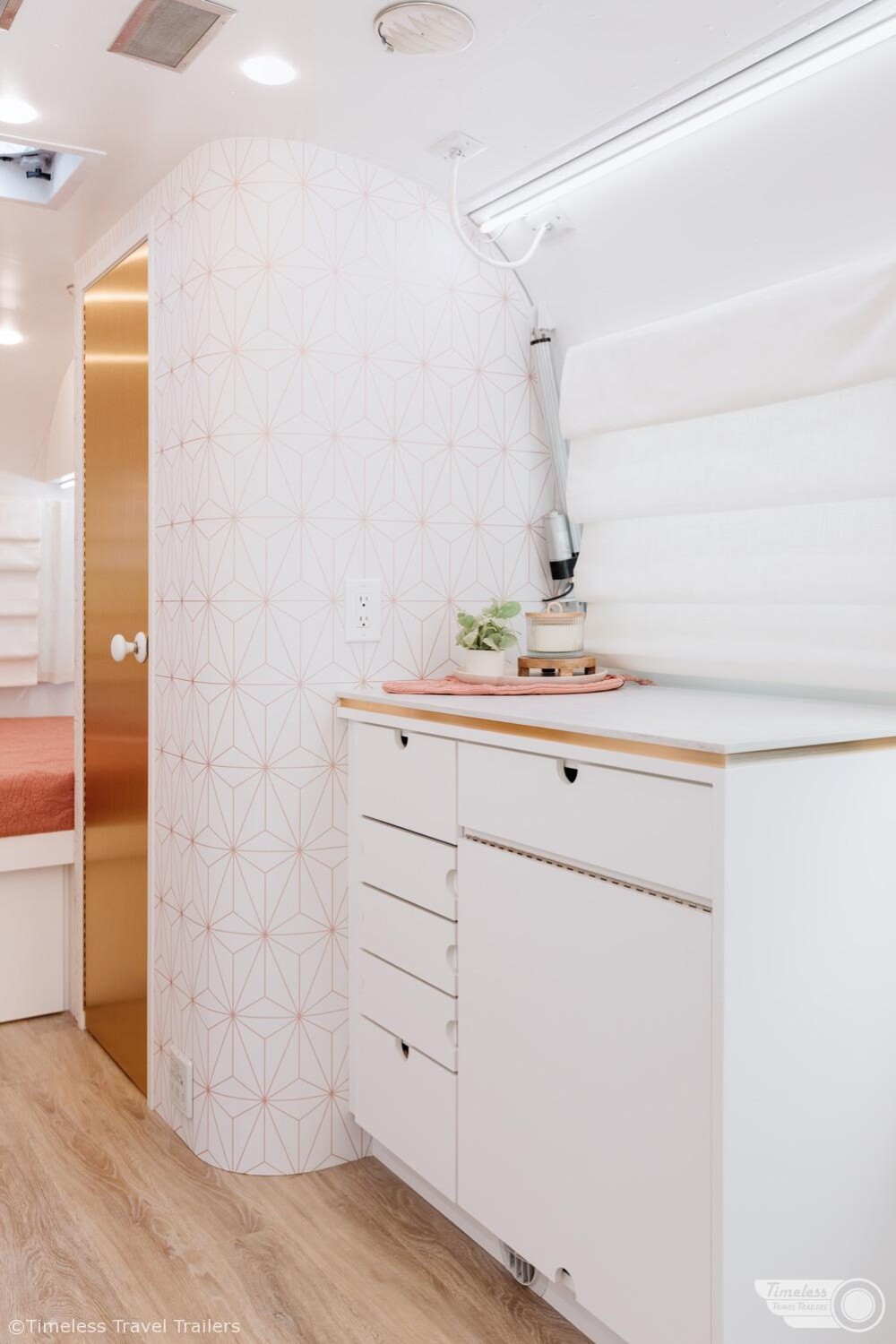 Meet Rosie: The 22-Foot Rose-Gold Airstream with a Built-in Tesla ...