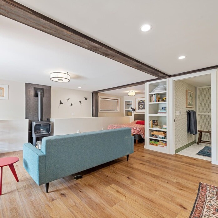 Basement Garage Was Converted Into a Bright and Whimsical Living Space ...