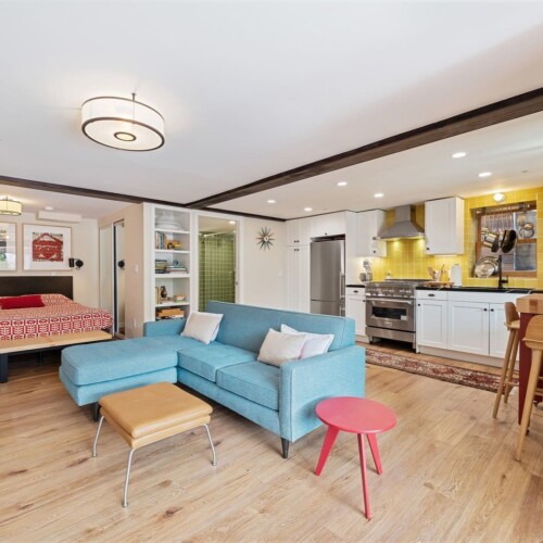 Basement Garage Was Converted Into a Bright and Whimsical Living Space ...