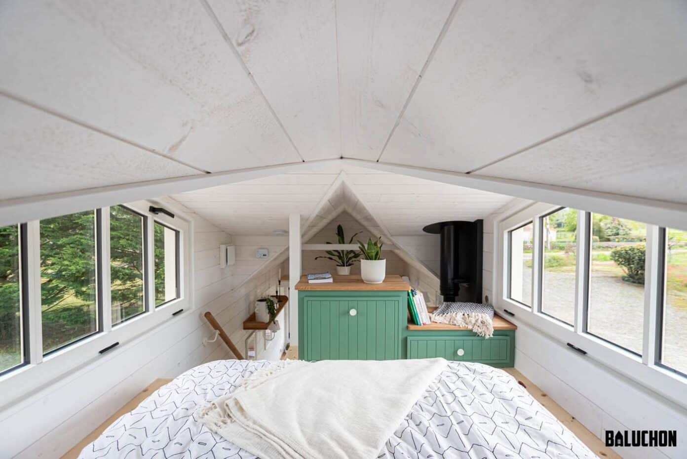 Hytta Tiny House Showcases Custom Pink Roof, Smart Storage and Quaint ...
